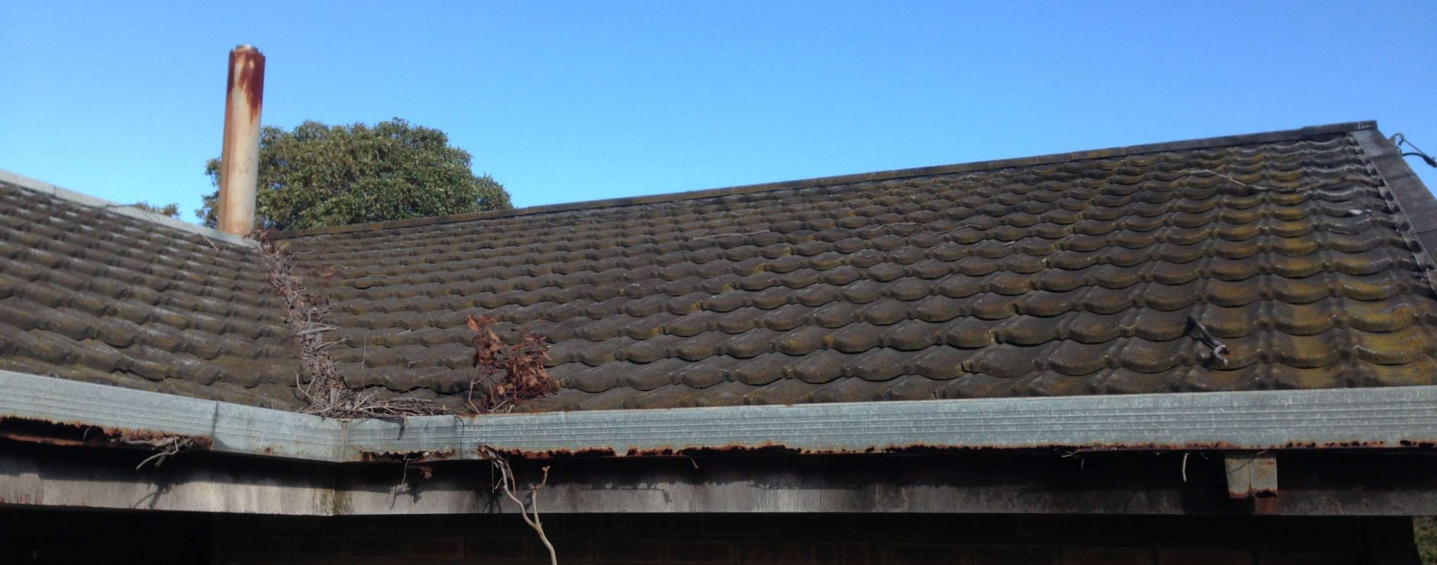 Bituminous coated imitation roof tiles - Asbestos Product Guide