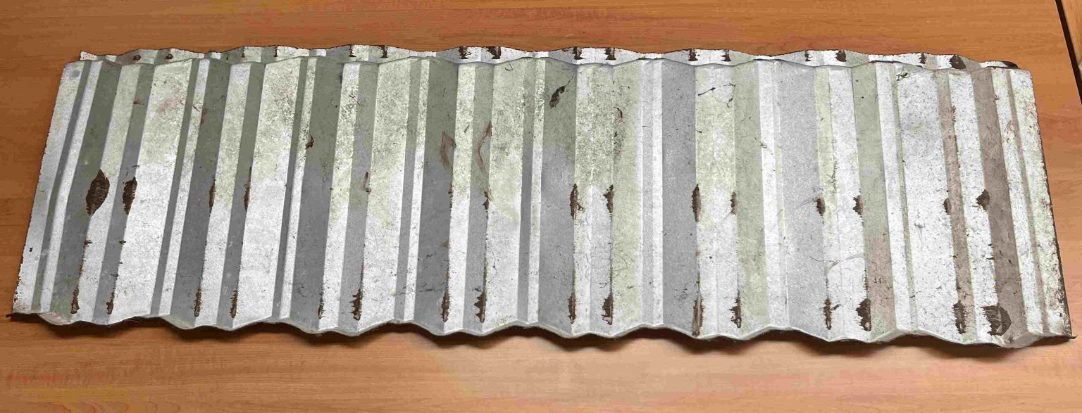 Bituminous coated imitation roof tiles - Asbestos Product Guide