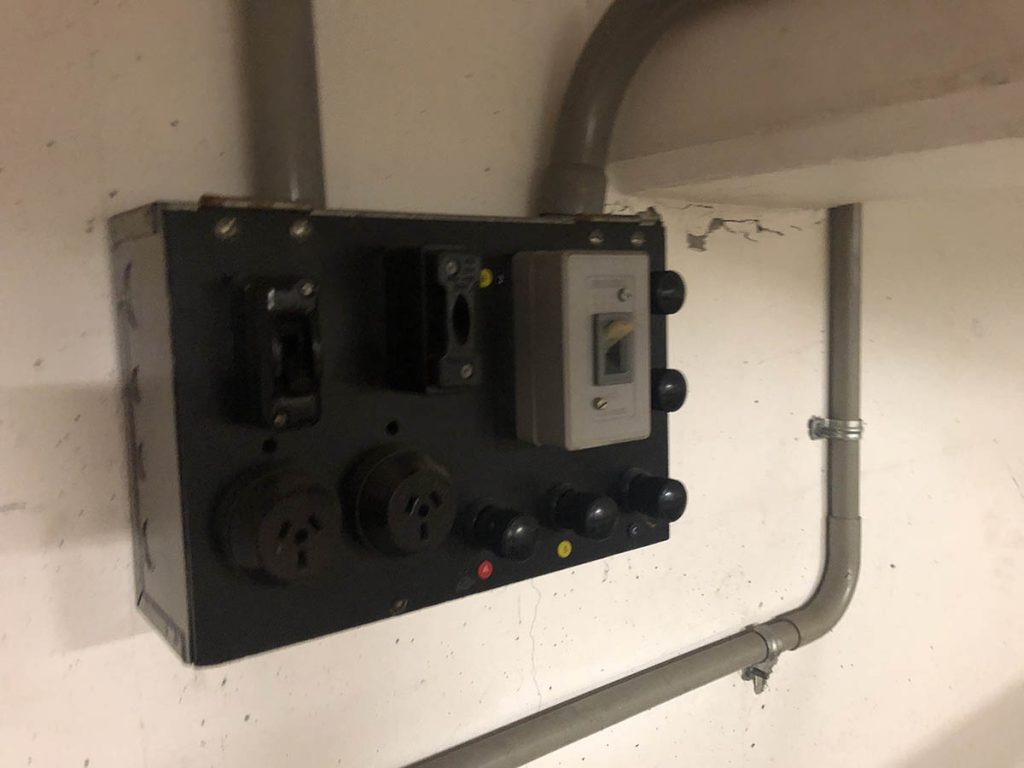 Electrical fuse/meter board backing - Asbestos Product Guide