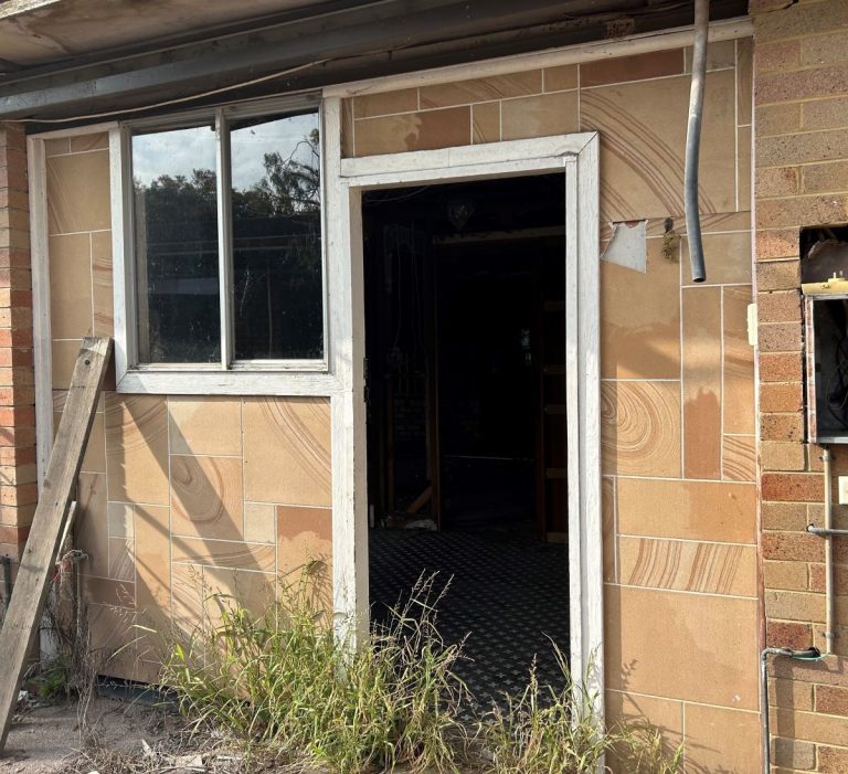 Imitation stone on asbestos cement sheeting - Asbestos Product Guide