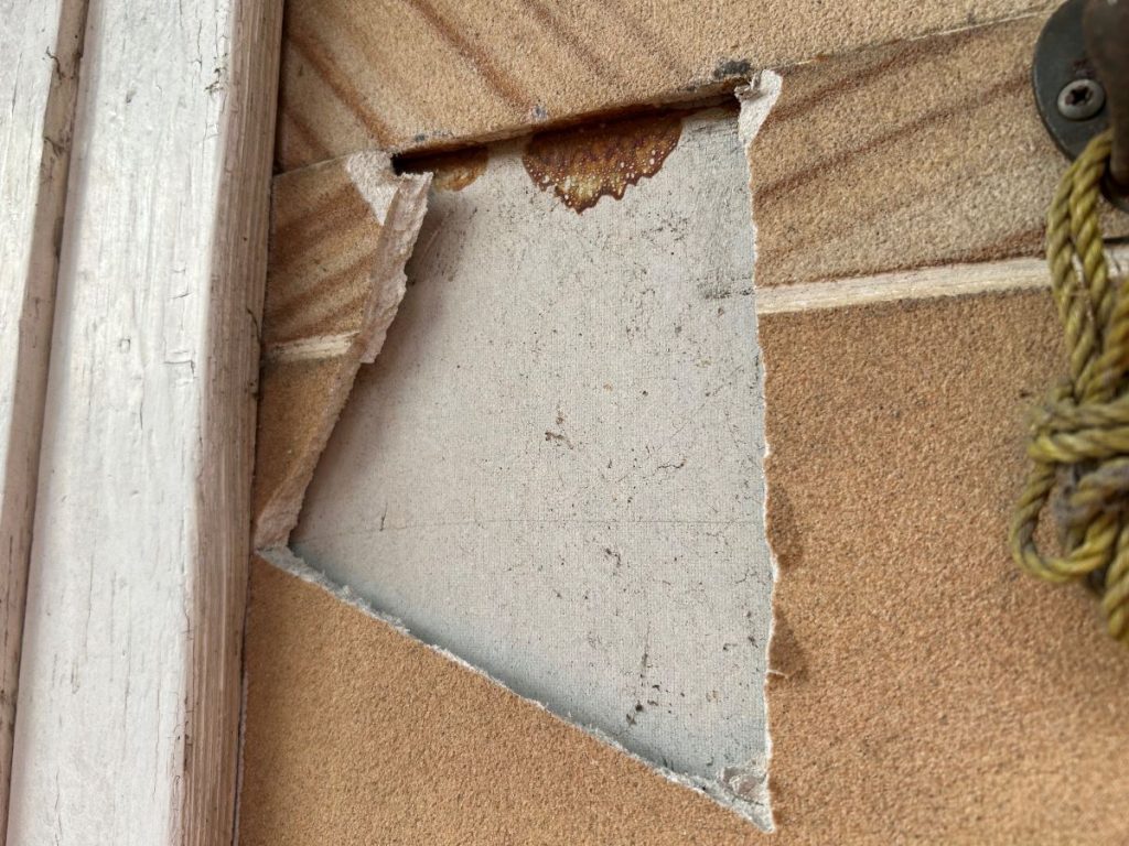 Imitation stone on asbestos cement sheeting - Asbestos Product Guide